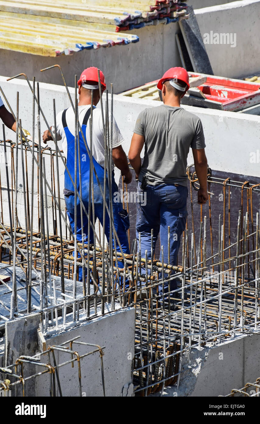 Construction workers at work Stock Photo - Alamy