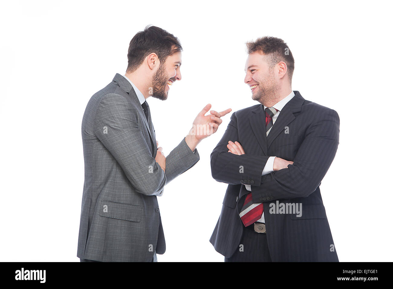 two businessmen discusting and smiling on white background Stock Photo ...