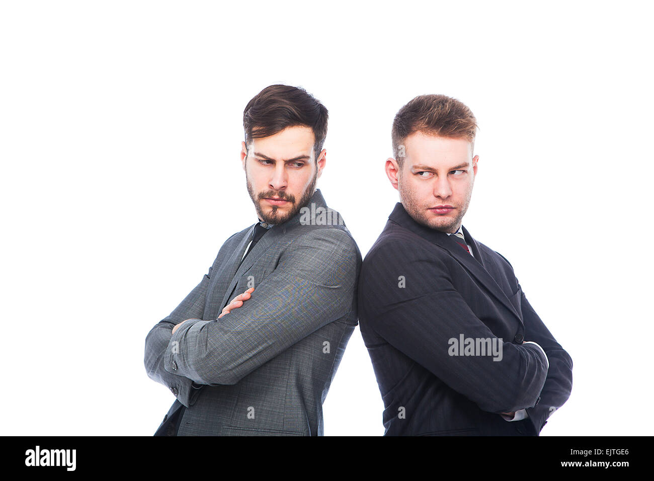 two businessmen sitting back to back on white background Stock Photo ...
