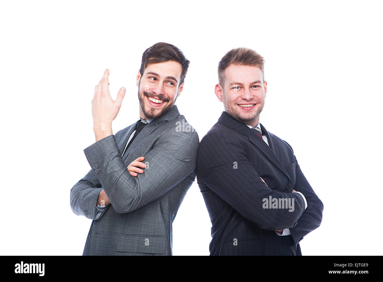 smiling and expresive businessmen back to back on white background ...
