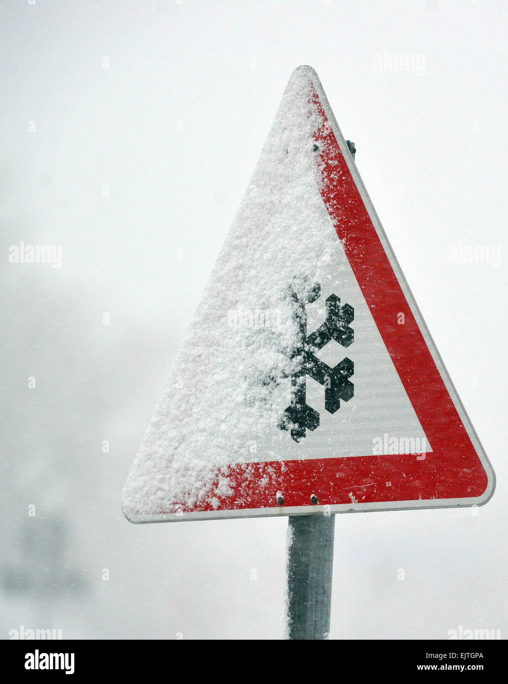 Nesselwang, Germany. 01st Apr, 2015. A traffic sign alerting to hard ...