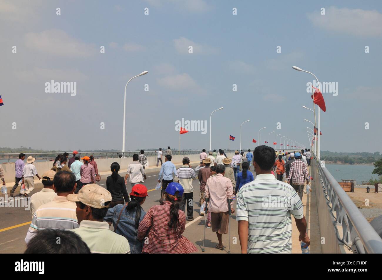Stung Treng, Cambodia. 1st Apr, 2015. People walk on the Mekong River ...