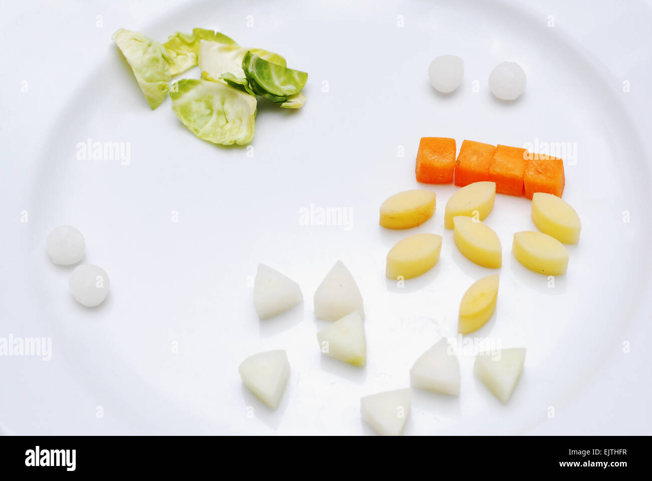 Designed food on a plate Stock Photo - Alamy