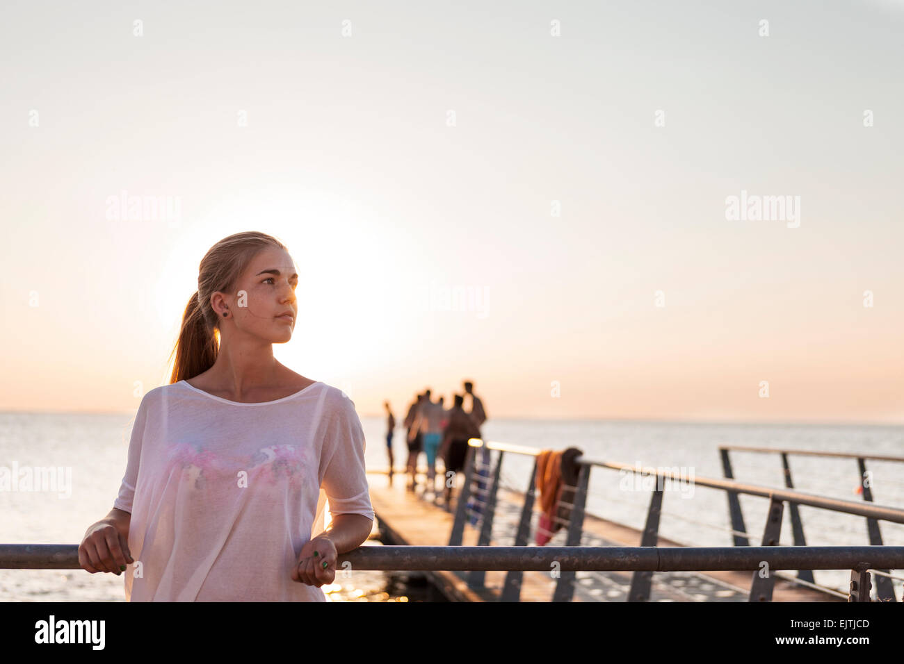 Woman Leaning On Railing High Resolution Stock Photography and Images ...