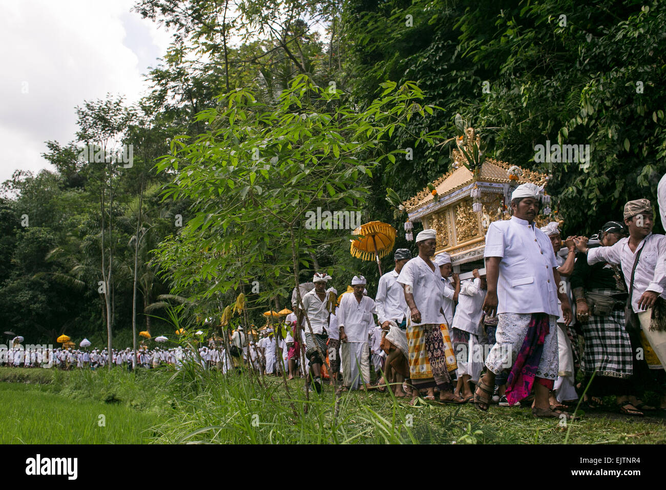 Bali, Indonesia. 1st Apr, 2015. Balinese Hindu devotees carry 'Pratima ...