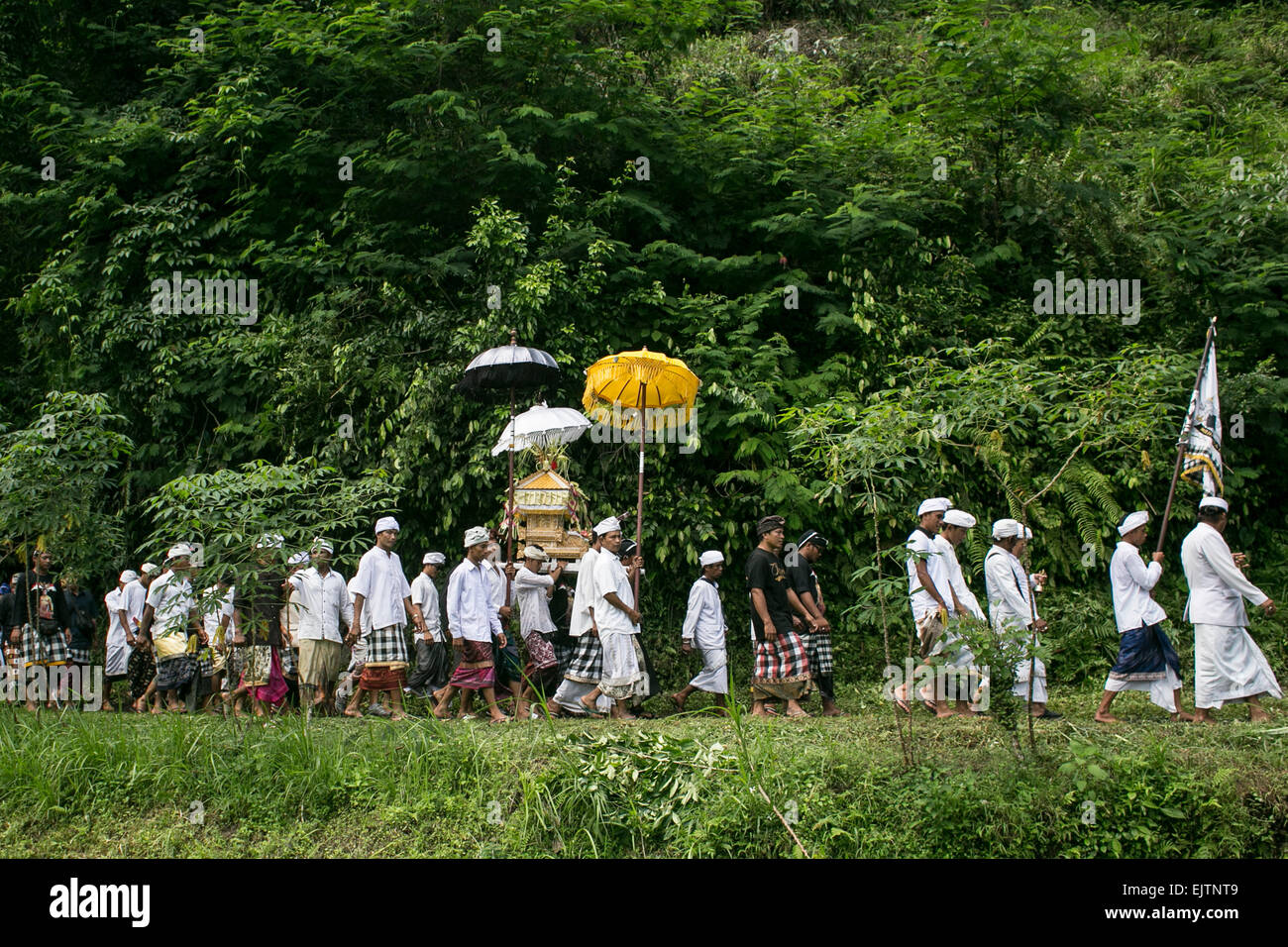 Bali, Indonesia. 1st Apr, 2015. Balinese Hindu devotees carry 'Pratima ...