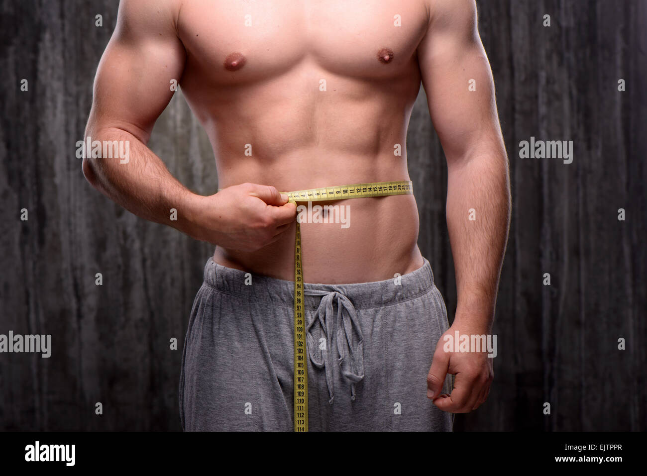 Male waist measuring tape hi-res stock photography and images - Alamy