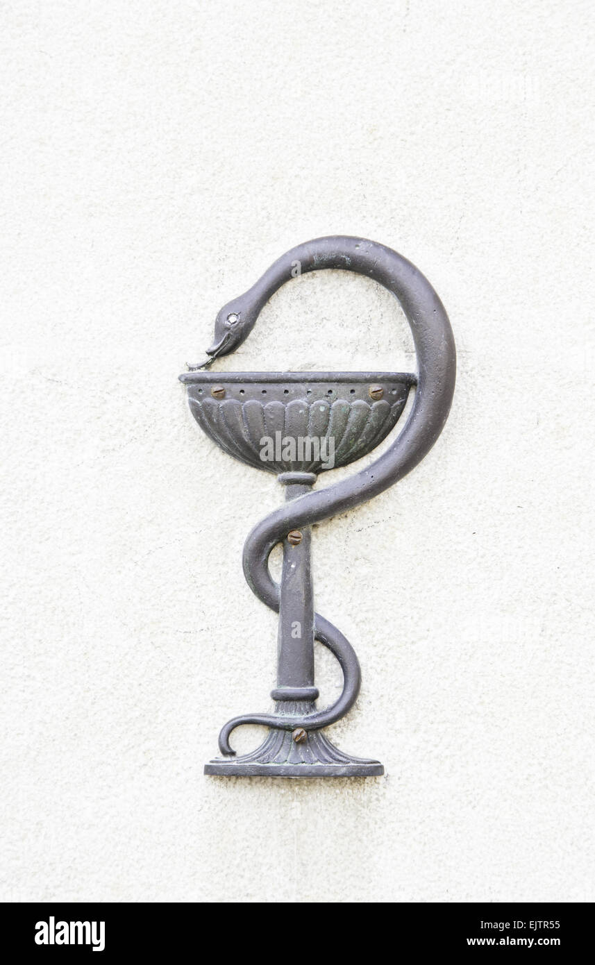 Symbol of pharmacy, detail of an ancient sign of a pharmacy, medicine ...