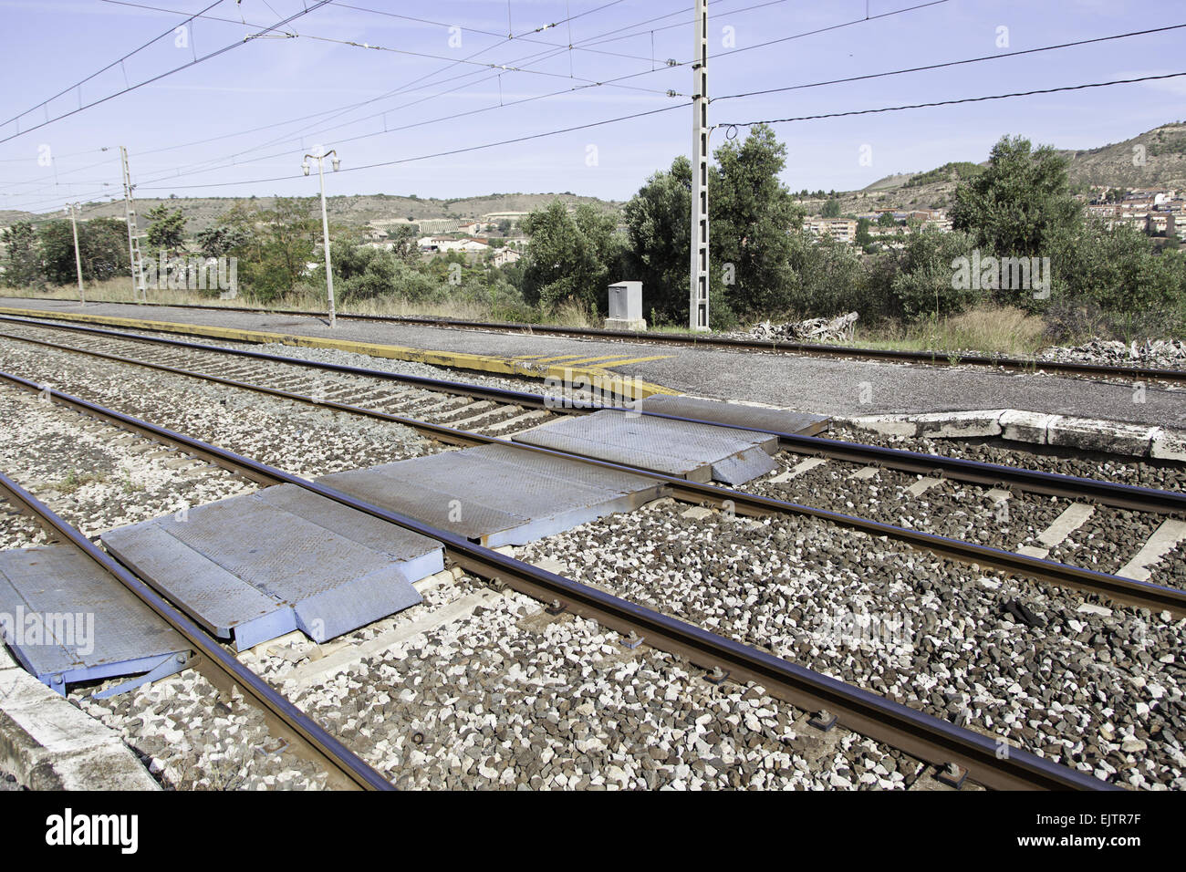 Railroad tracks at a station, a detail of train tracks, land transport ...