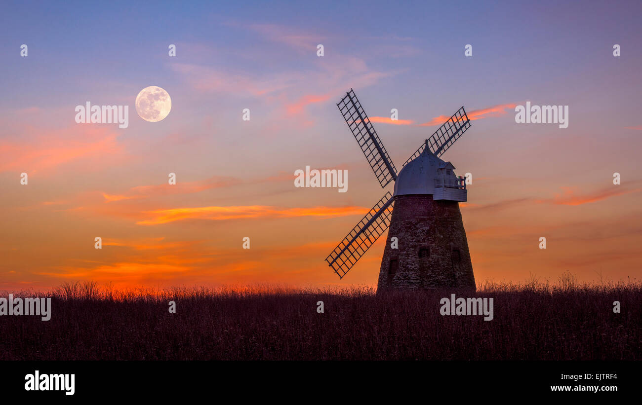 Old windmill at sunset with full moon Stock Photo - Alamy