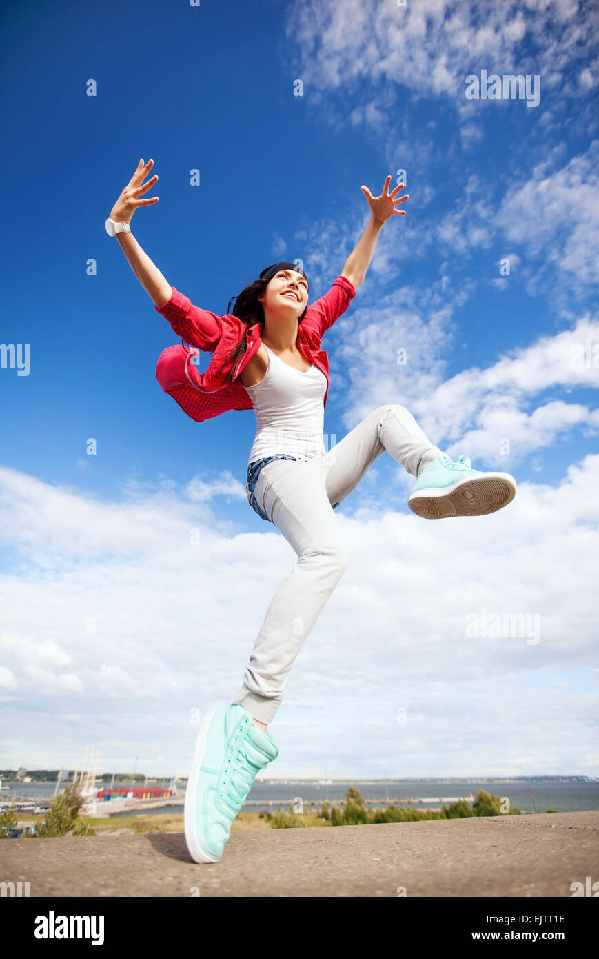 beautiful dancing girl jumping Stock Photo - Alamy