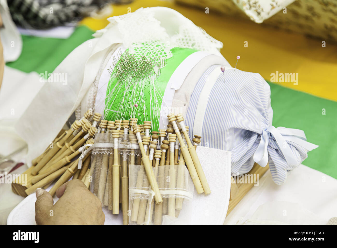 Traditional bobbin lace, detail of a women weaving, ancient tradition ...