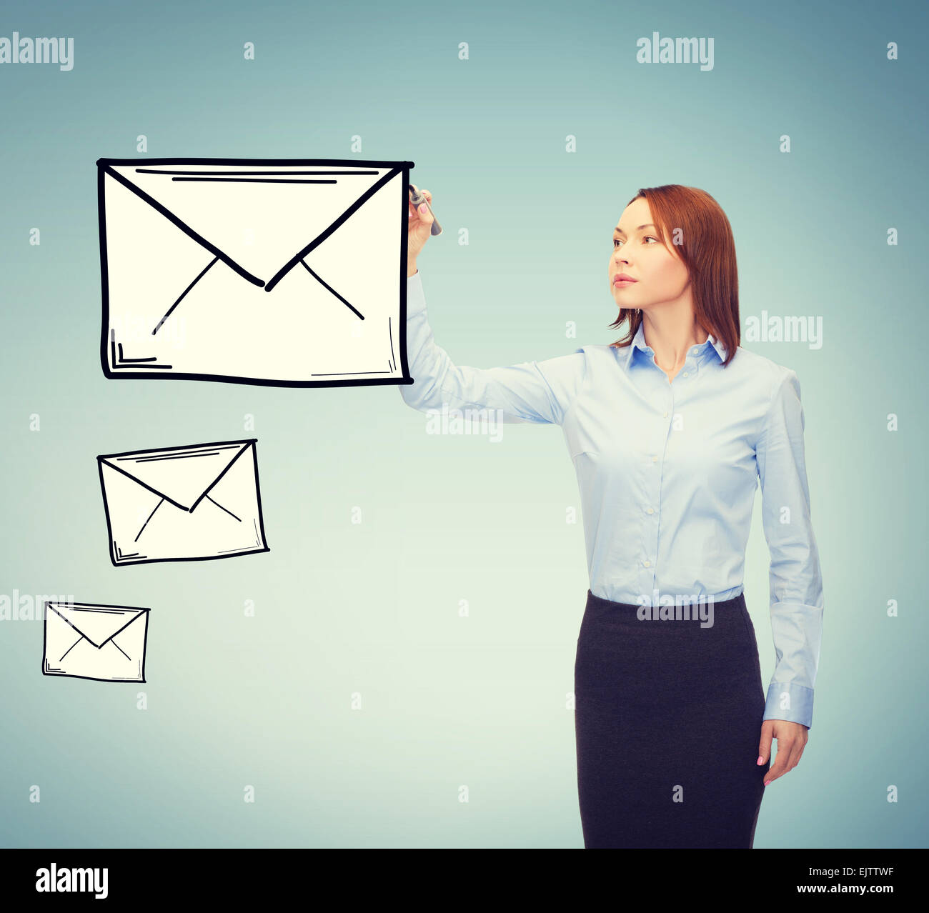 businesswoman drawing envelope on virtual screen Stock Photo - Alamy