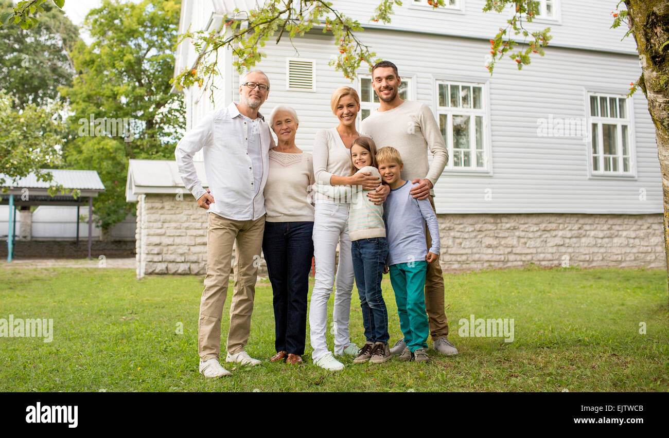 happy family in front of house outdoors Stock Photo - Alamy