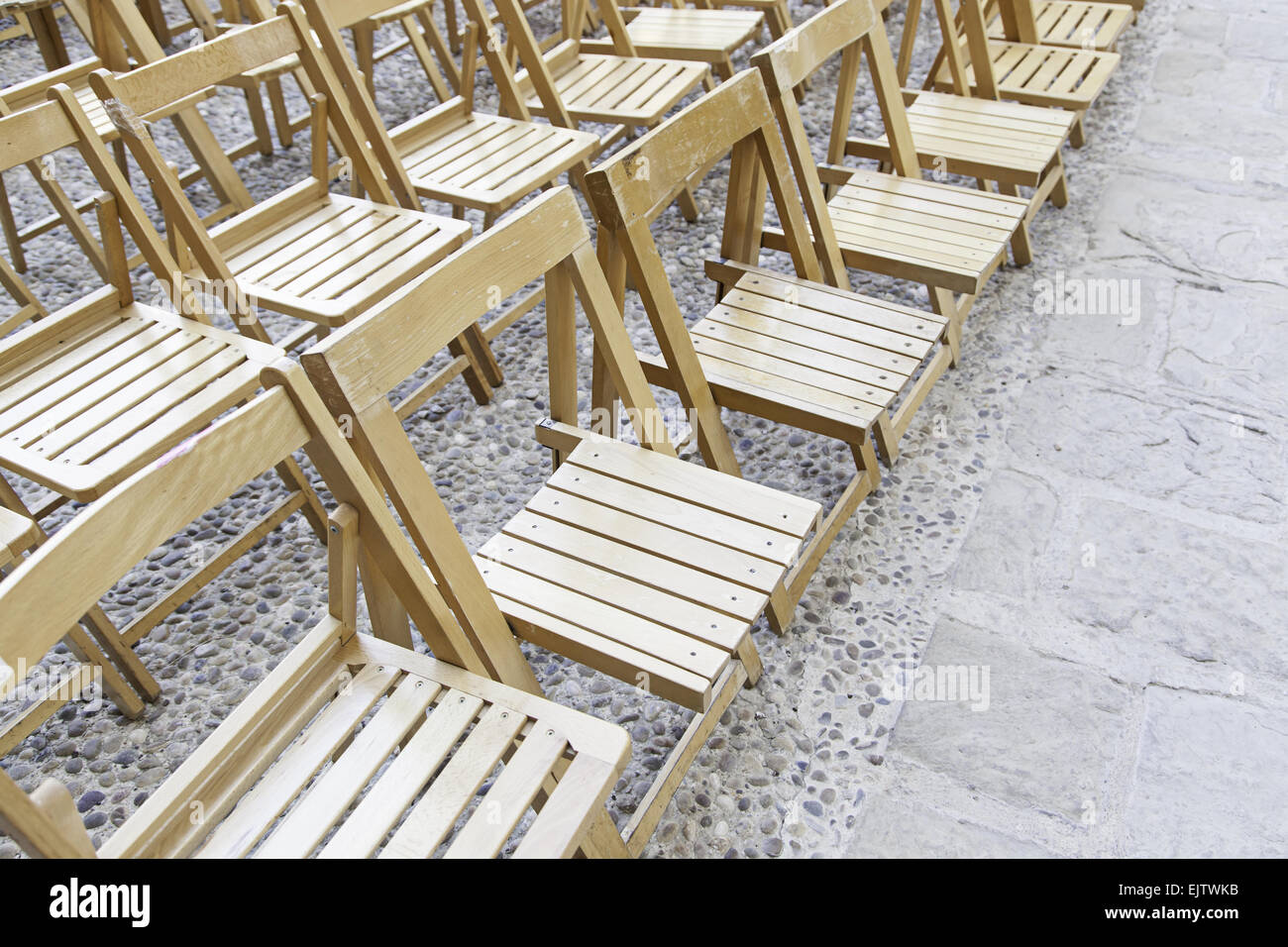 Wooden chairs in a concert, detail of one seat to see a show Stock ...