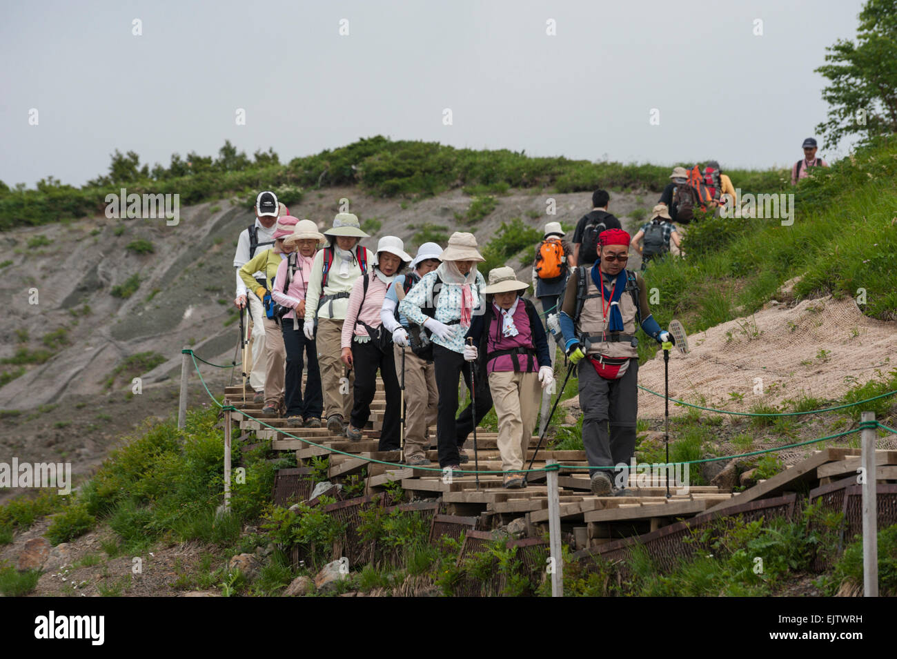 Japanese hikers of all ages enjoy the lower mountains around Happo Ike ...