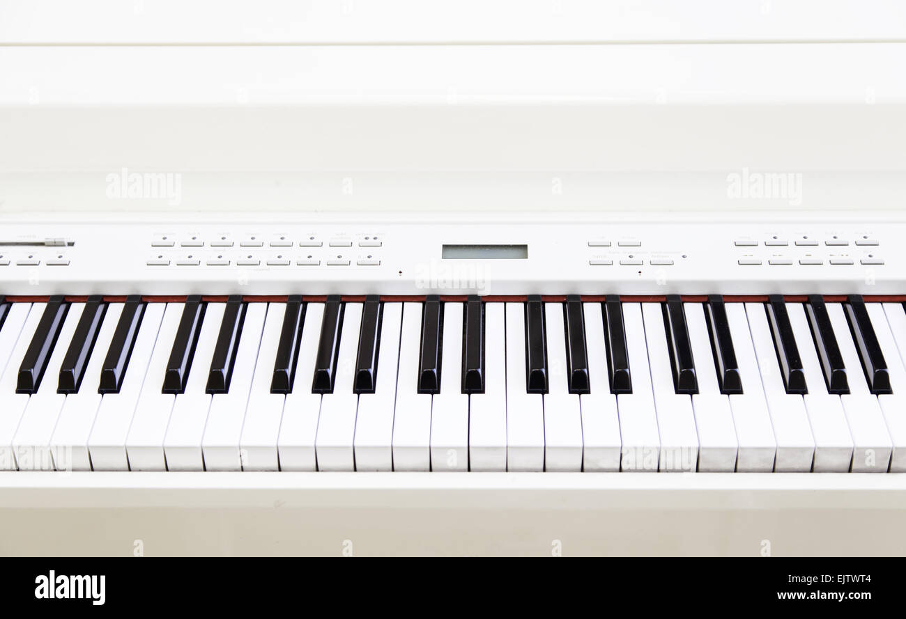 White piano on stage, detail musial instrument of classical music Stock ...