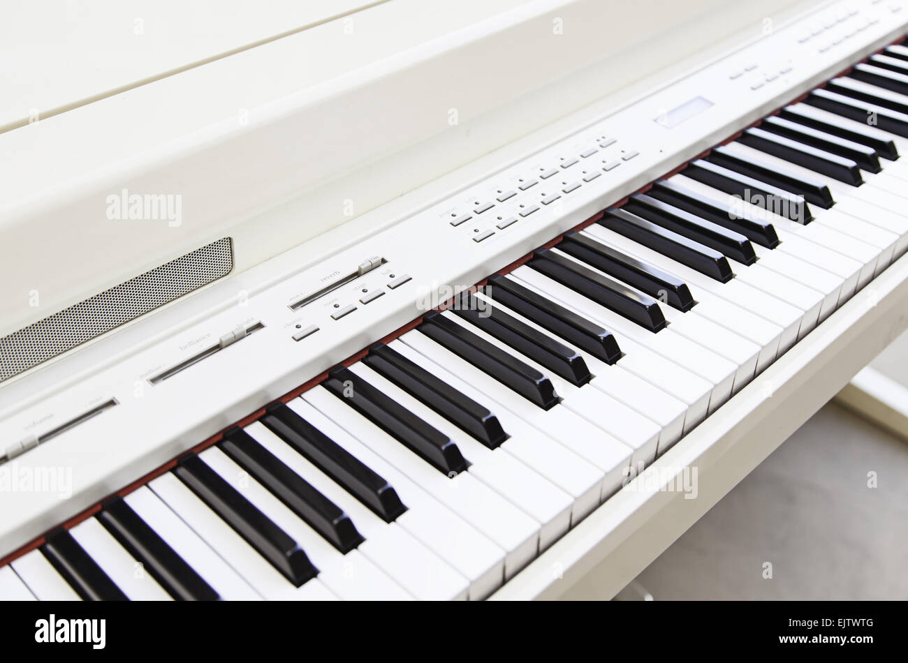 White piano on stage, detail musial instrument of classical music Stock ...