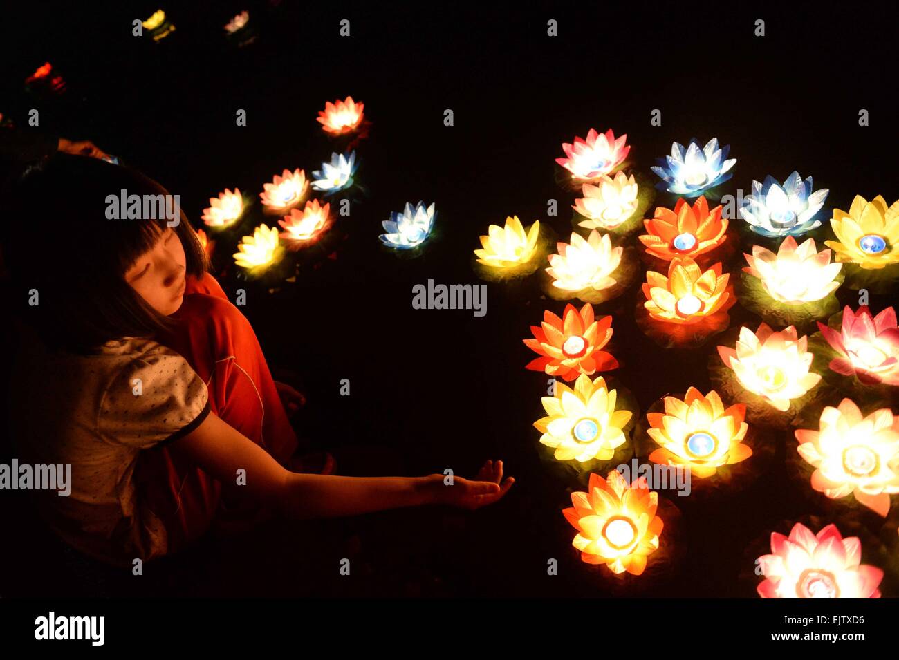 Nanchang, China's Jiangxi Province. 1st Apr, 2015. A girl floats river ...