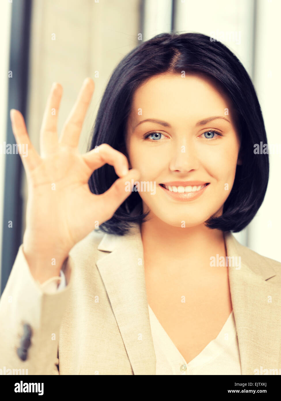 young woman showing ok sign Stock Photo - Alamy