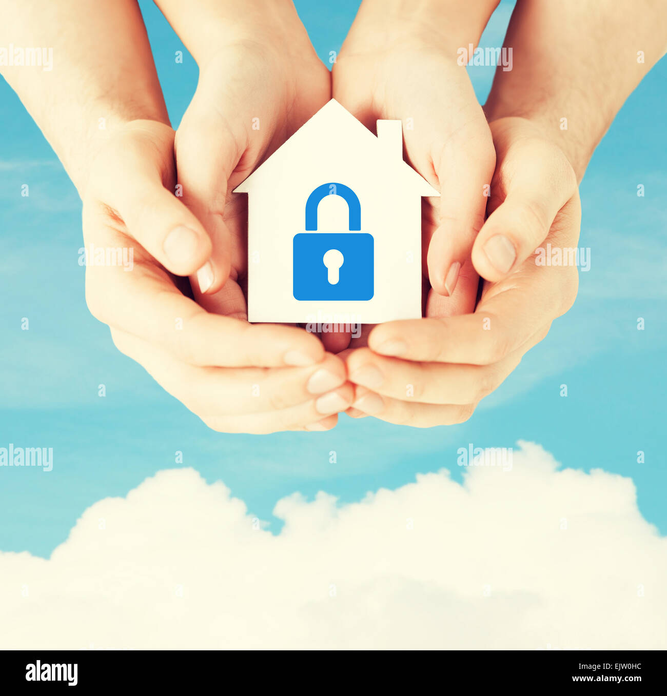 hands holding paper house with lock Stock Photo - Alamy