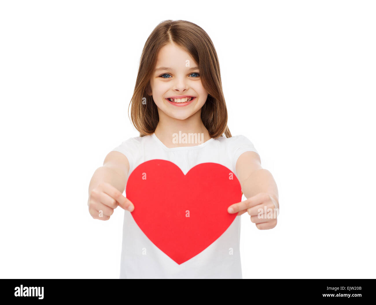 smiling little girl giving red heart Stock Photo - Alamy