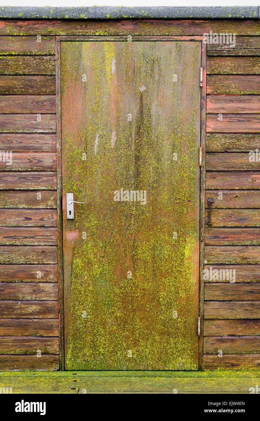 Weathered Wooden Outside Door Stock Photo - Alamy