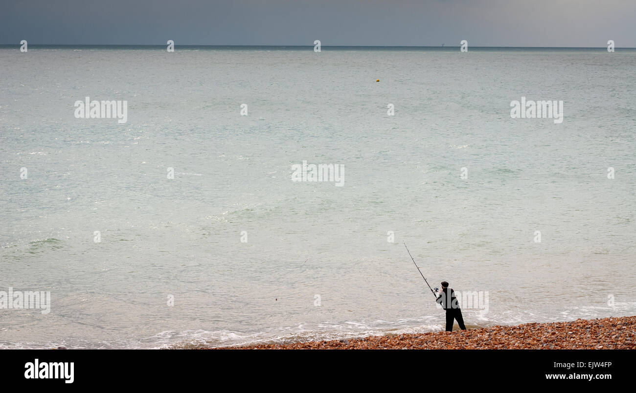 Man Sea Fishing From Beach Stock Photo - Alamy