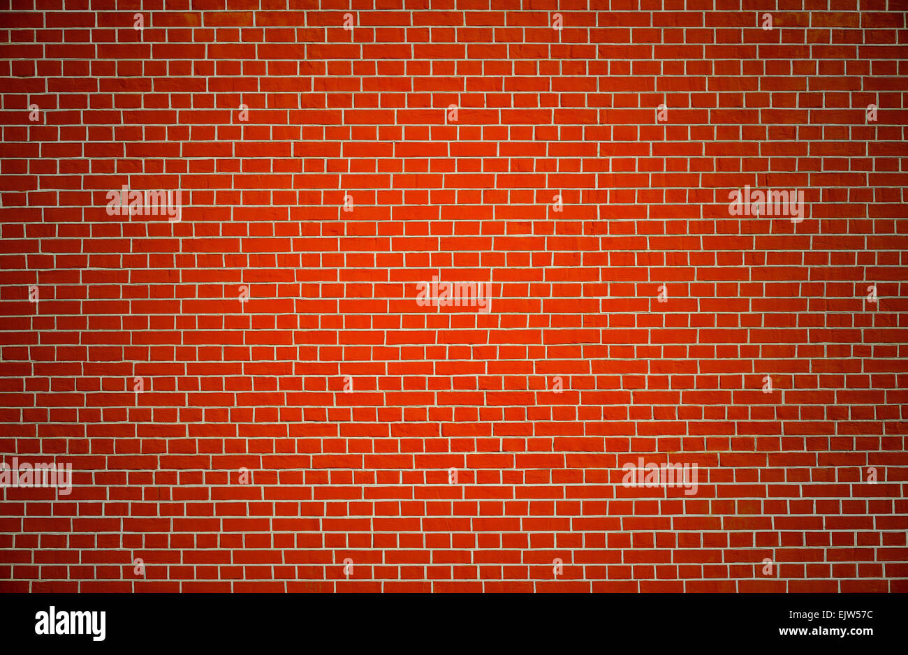 Red brick wall background inside of the room Stock Photo - Alamy