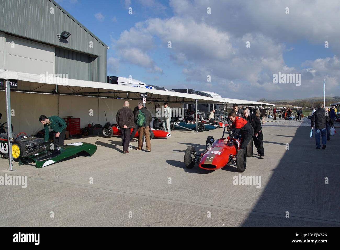 A Lotus Ford Formula 3 car making it's way to scrutineering in the pits ...