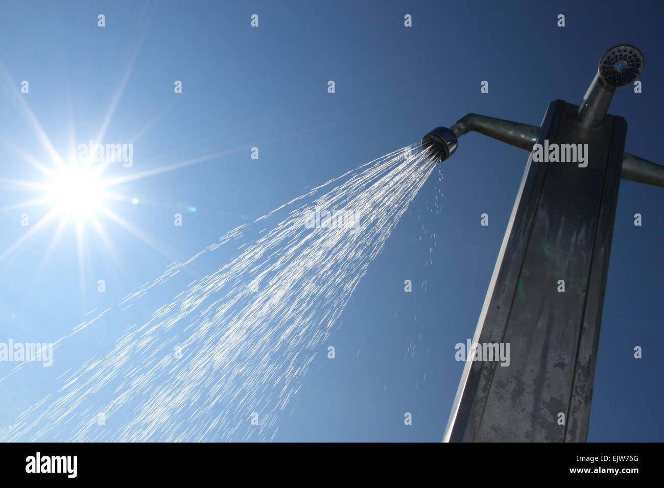 Woman showering outside hi-res stock photography and images - Alamy