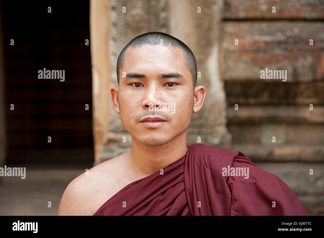 Serious buddhist monk portrait in myanmar hi-res stock photography and ...