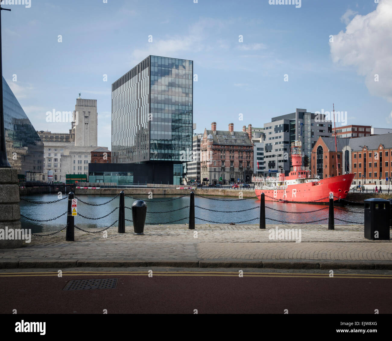 Architecture and red lightship at Albert Dock, Liverpool, UK Stock ...