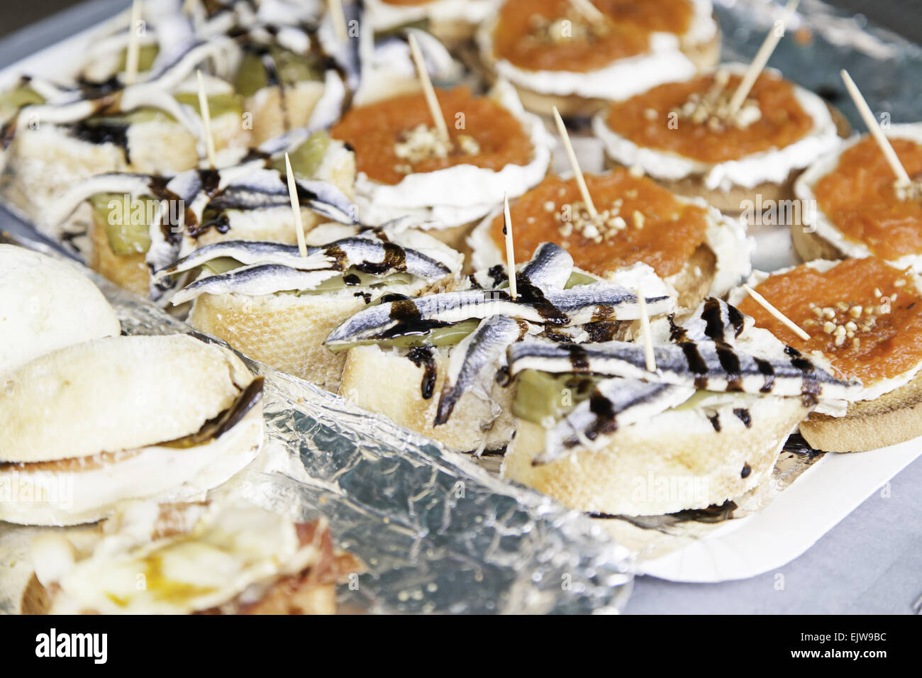 Anchovy skewers in a bar, detail of a typical Spanish appetizer Stock ...