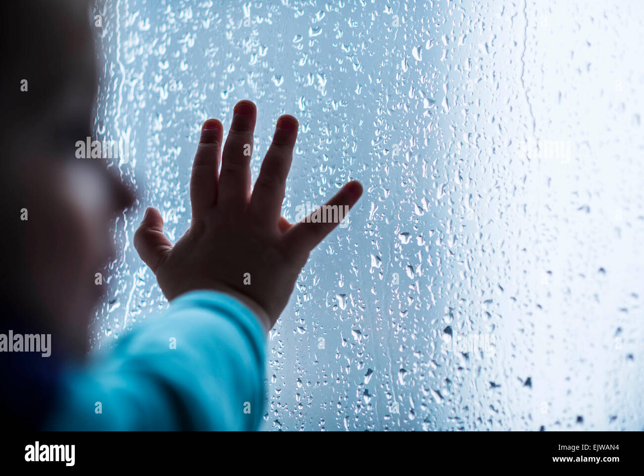Child window hand on glass hi-res stock photography and images - Alamy