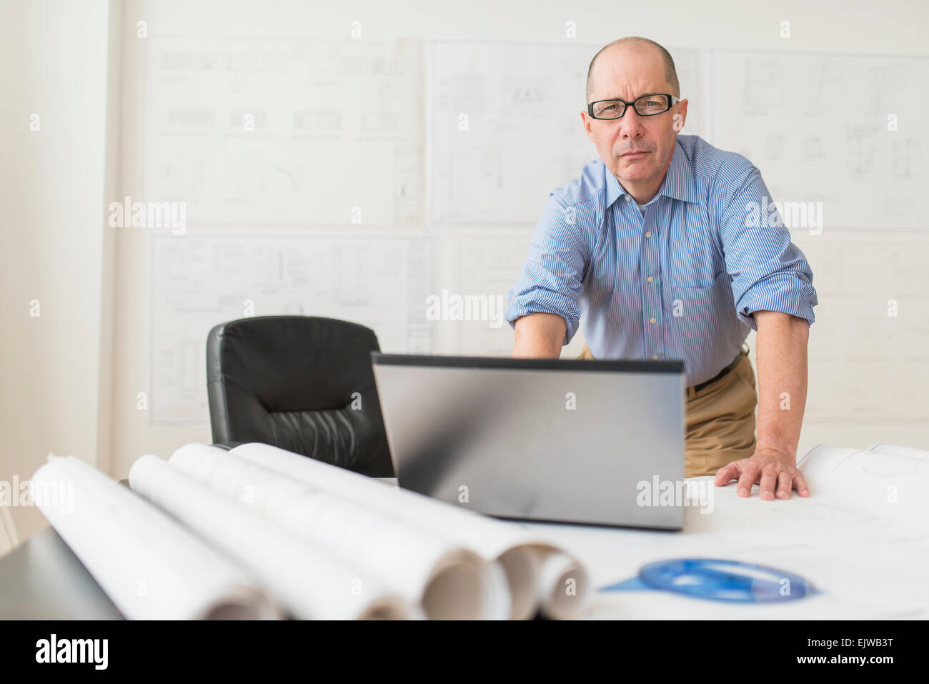 Professional male architect using ruler hi-res stock photography and ...