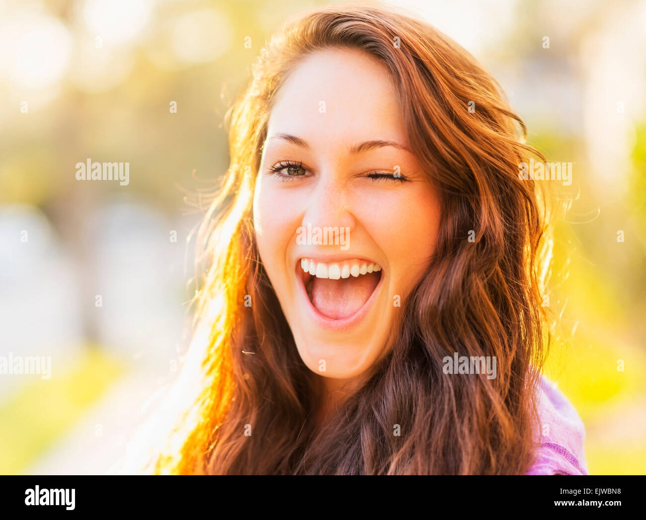 Winking woman hi-res stock photography and images - Alamy