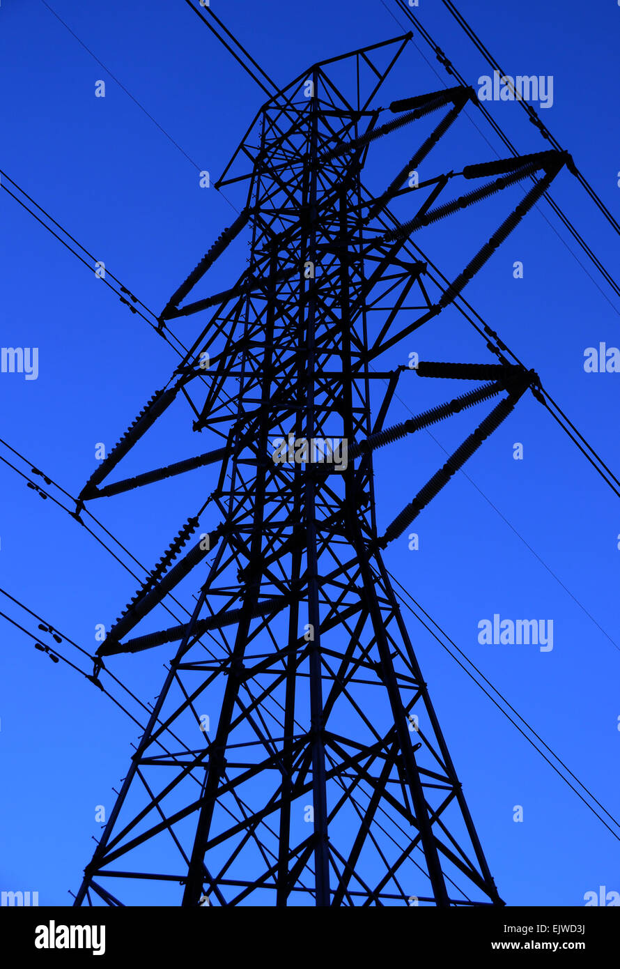 High Voltage Power Line Silhouette at Twilight Stock Photo - Alamy