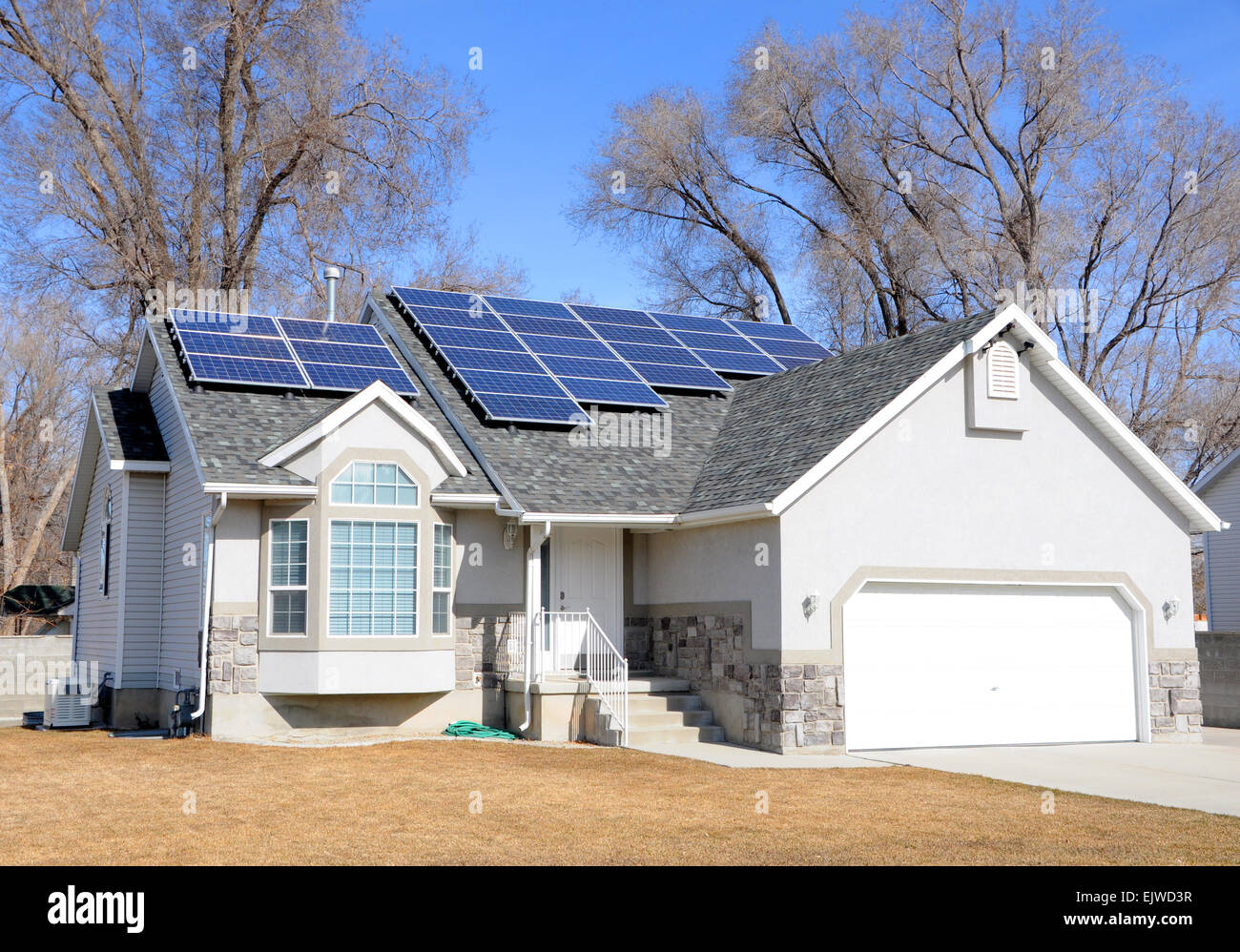 Solar Panel Power on Modern Family Home Stock Photo - Alamy