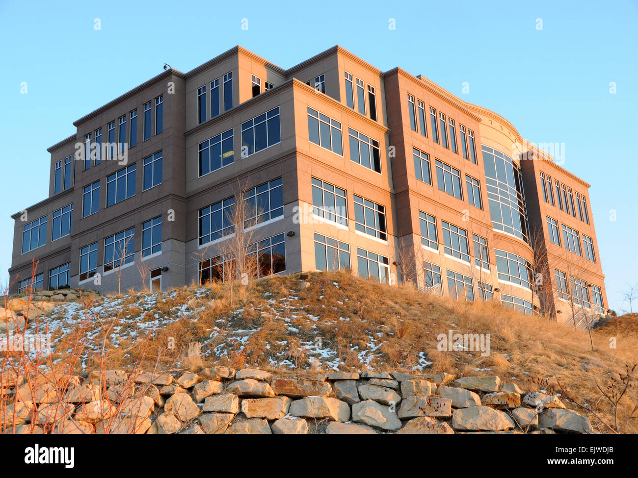 Office Building on a Hill at Sunset Stock Photo - Alamy