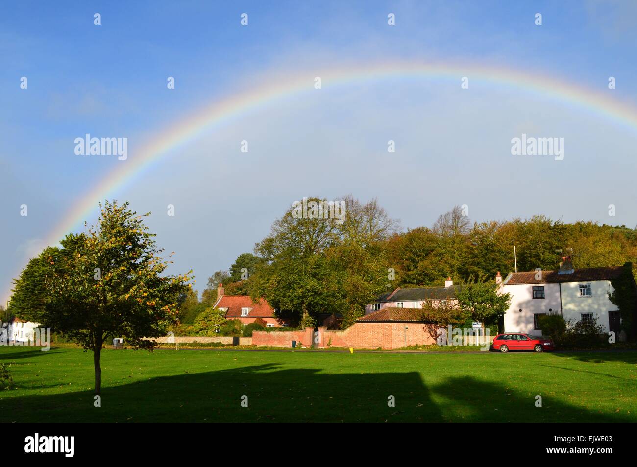 Rainbow over Westleton Village Green Stock Photo - Alamy
