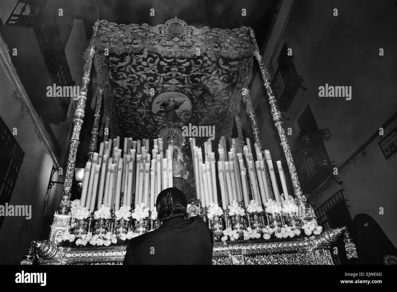 The Capataz, the person who manage and direct the costaleros who carry ...