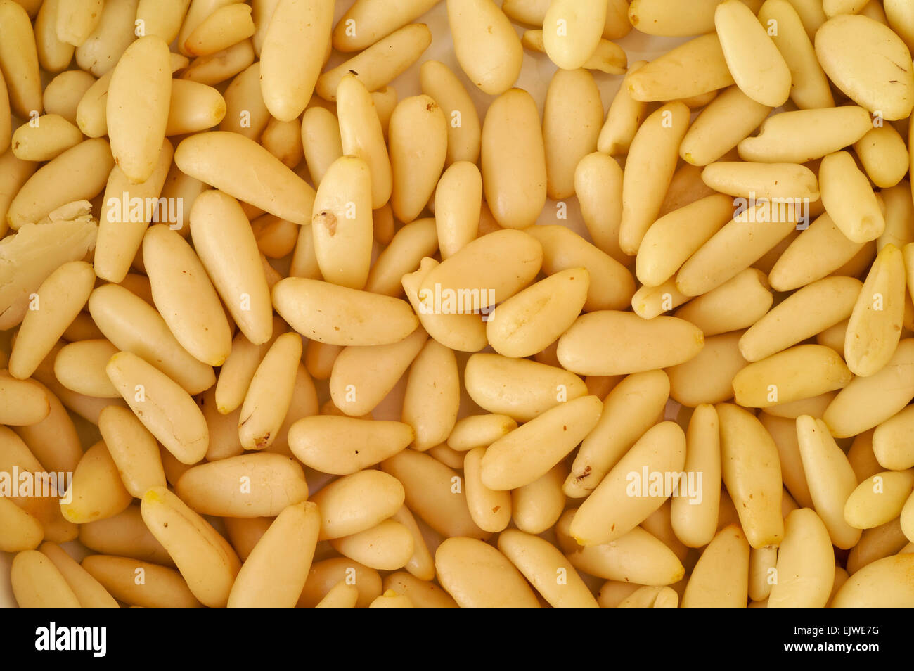 Pine seeds background closeup Stock Photo - Alamy