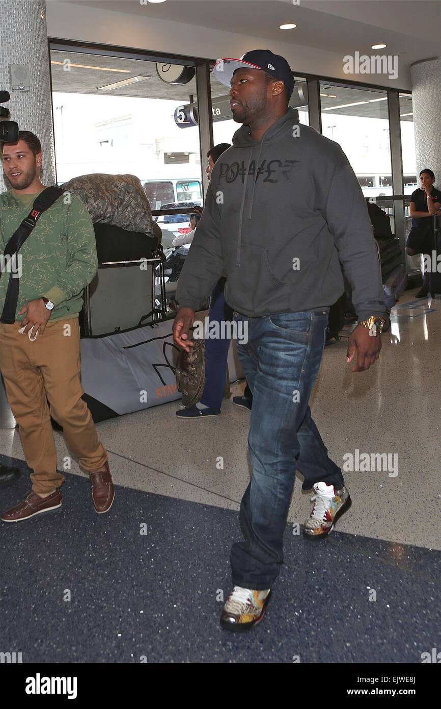 50 Cent takes a fighting stance as he departs from Los Angeles ...