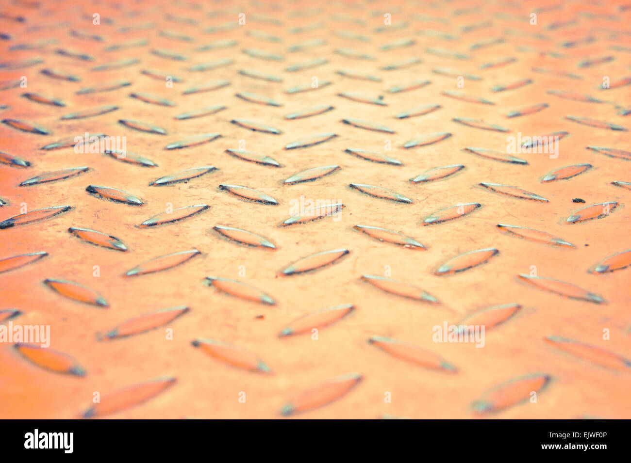 Red industrial metal sheet with shallow depth of field Stock Photo - Alamy