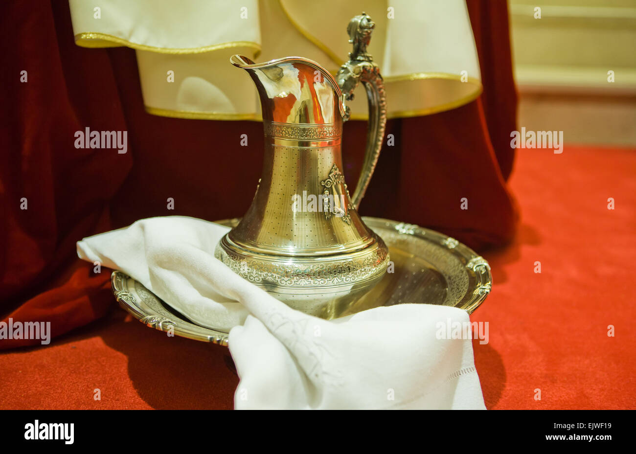 Basin And Pitcher which represents the holy scene when Jesus washed his ...