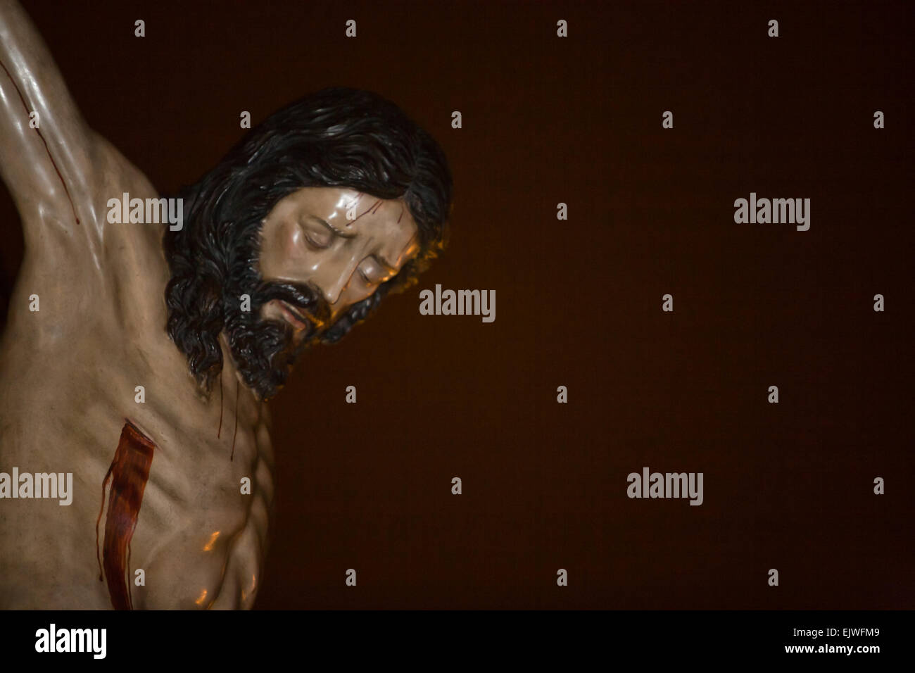 Jesus Christ on the cross during a procession of Holy Week in Spain ...