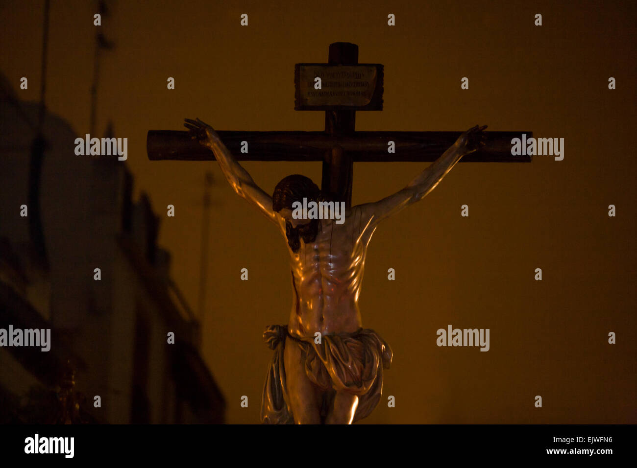 Jesus Christ on the cross during a procession of Holy Week in Spain ...
