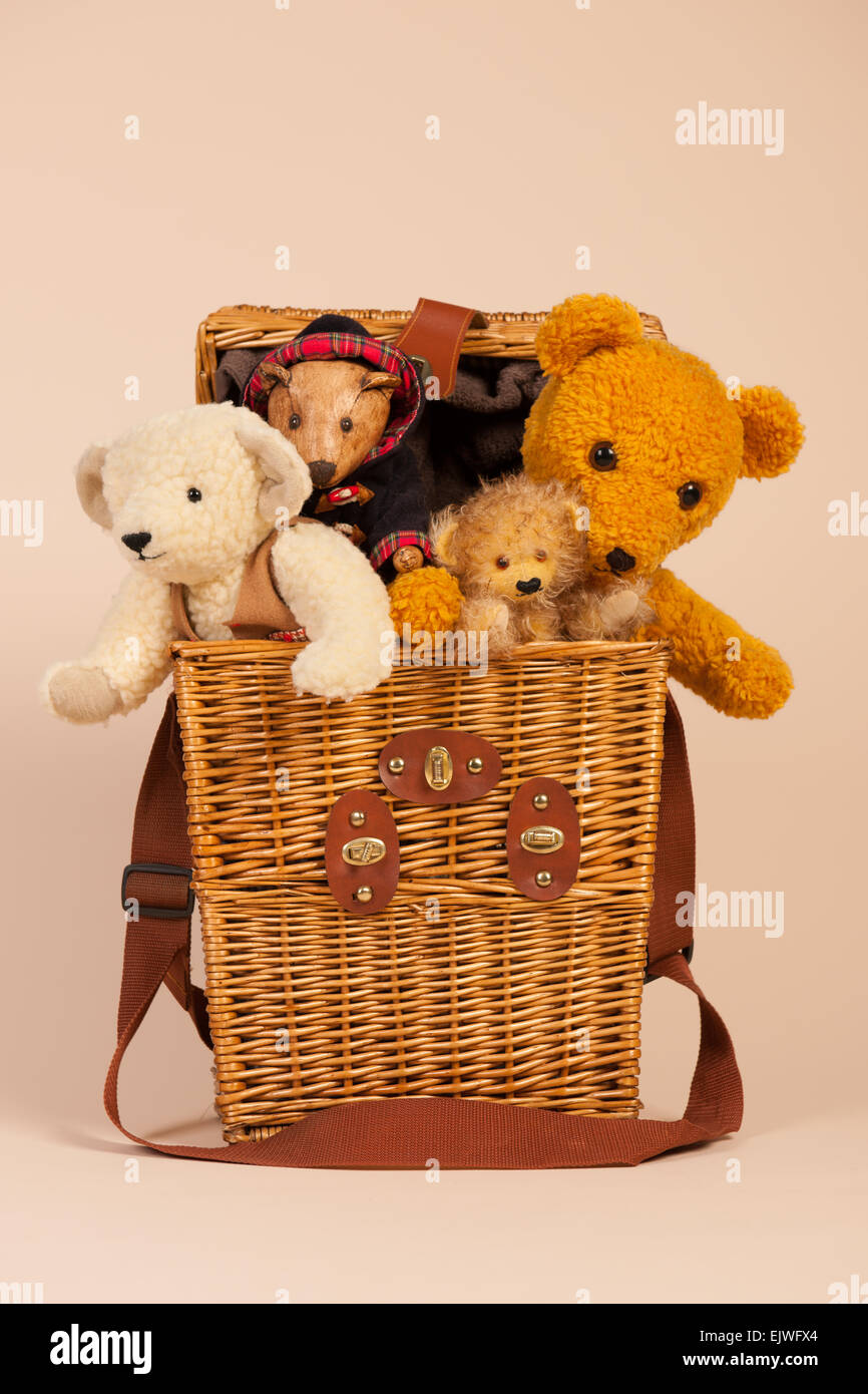 Stuffed hand made bears in toy box on beige background Stock Photo - Alamy