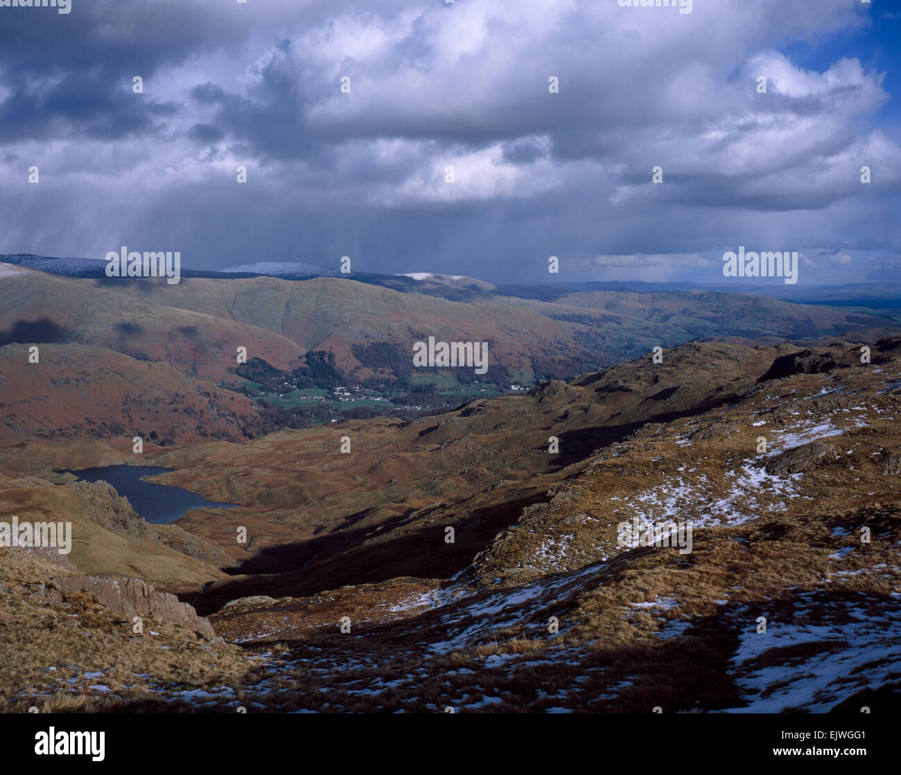 Storm clouds passing across Easedale Tarn and Grasmere from near Belles ...